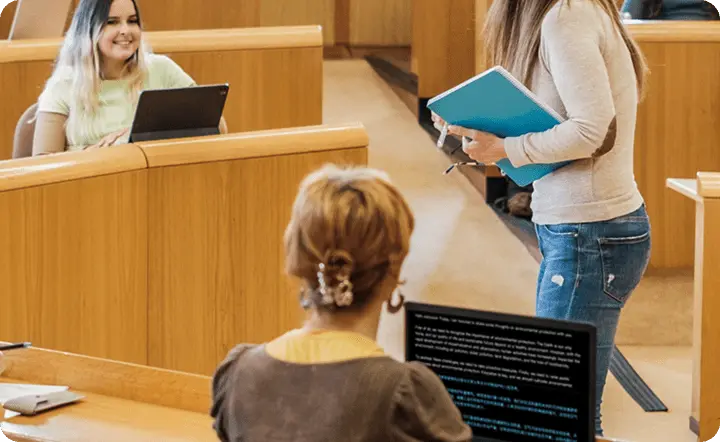 Live subtitles in a classroom setting, with a professor presenting and ...